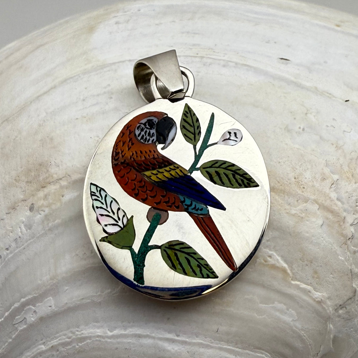 Parrot Zuni Inlay Pendant, by Ruddell Laconsello– Raven Makes Gallery